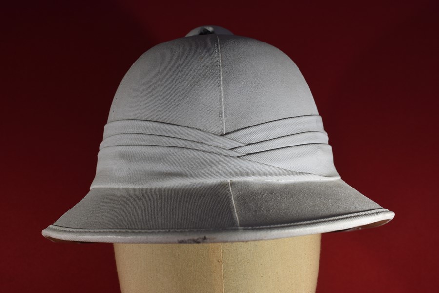 WW2 ISSUED WOLSELEY SUN HELMET DATED 1942-SOLD